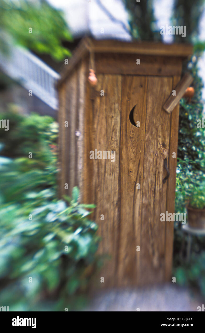 rustic early american style wooden out house Stock Photo - Alamy