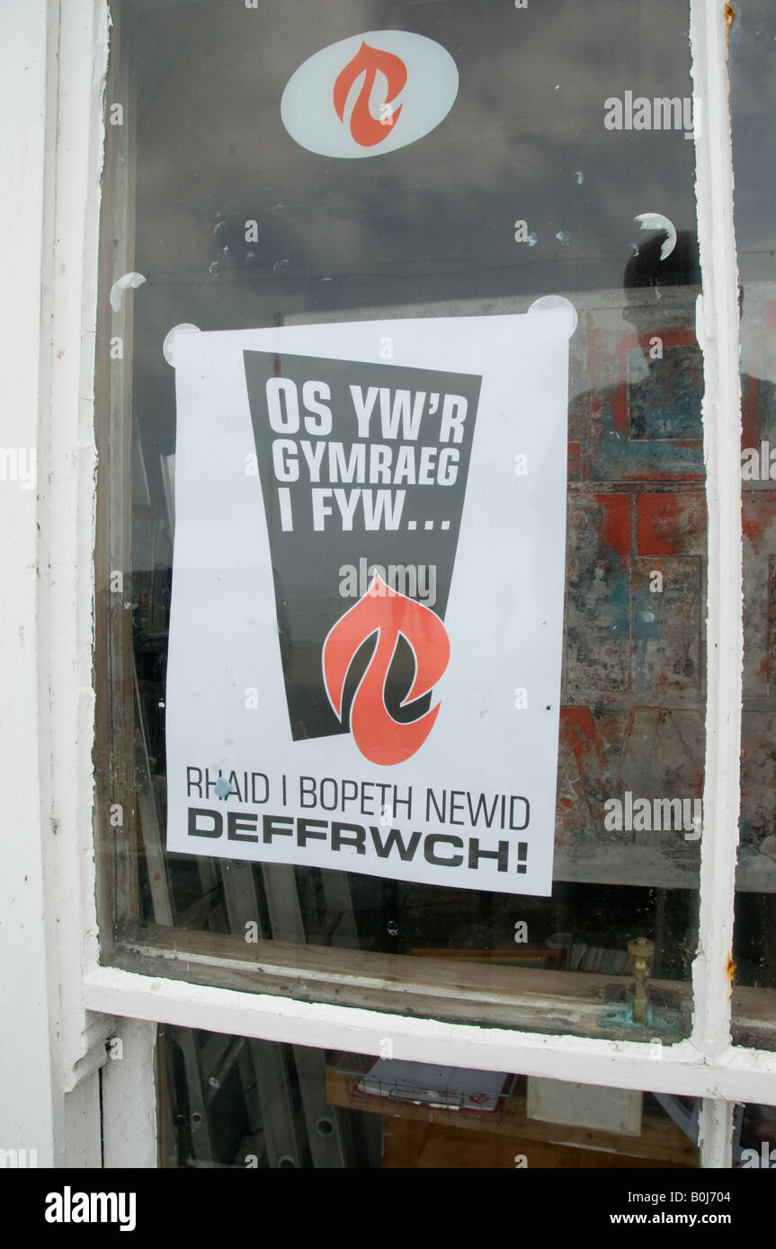 Welsh langauge society political poster in window calling for radical ...