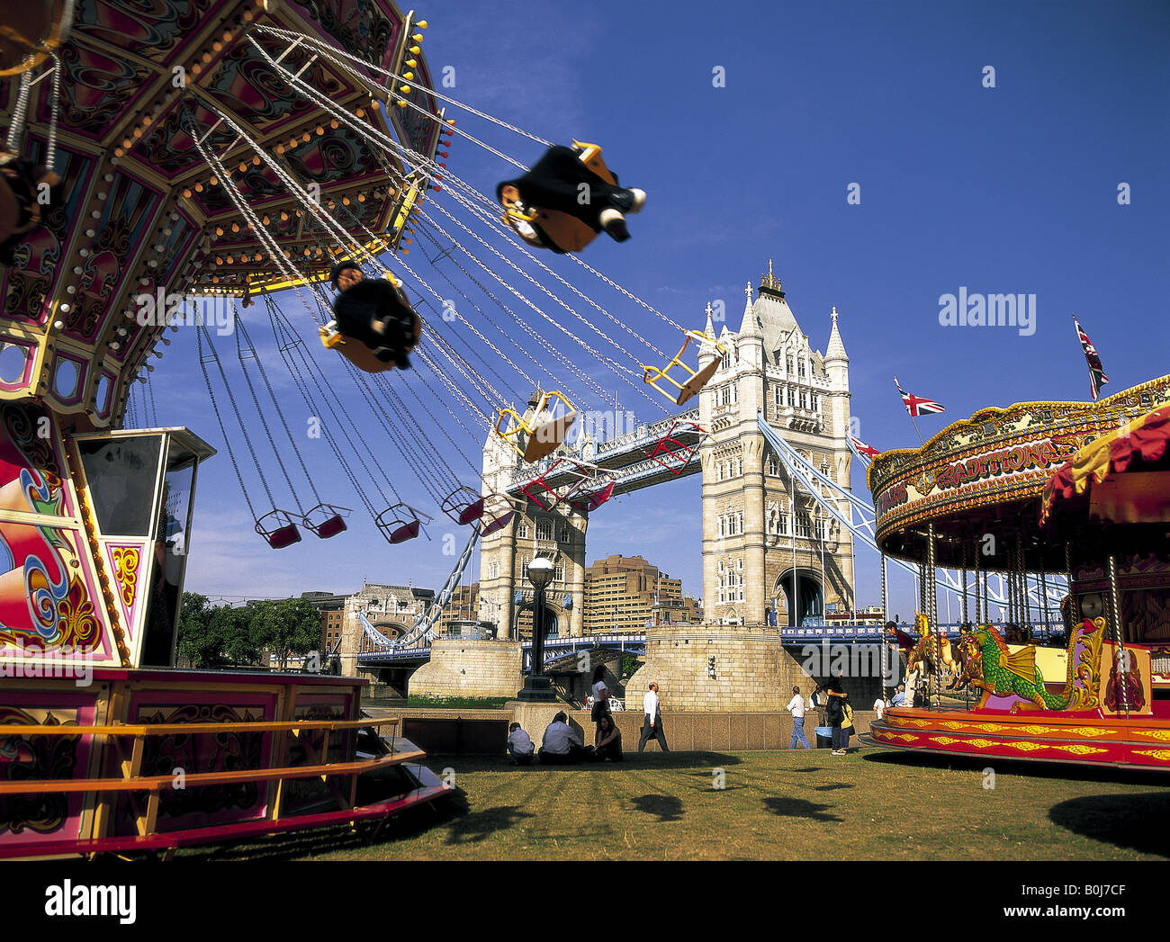 Fairground carousel by Tower Bridge London England Stock Photo - Alamy