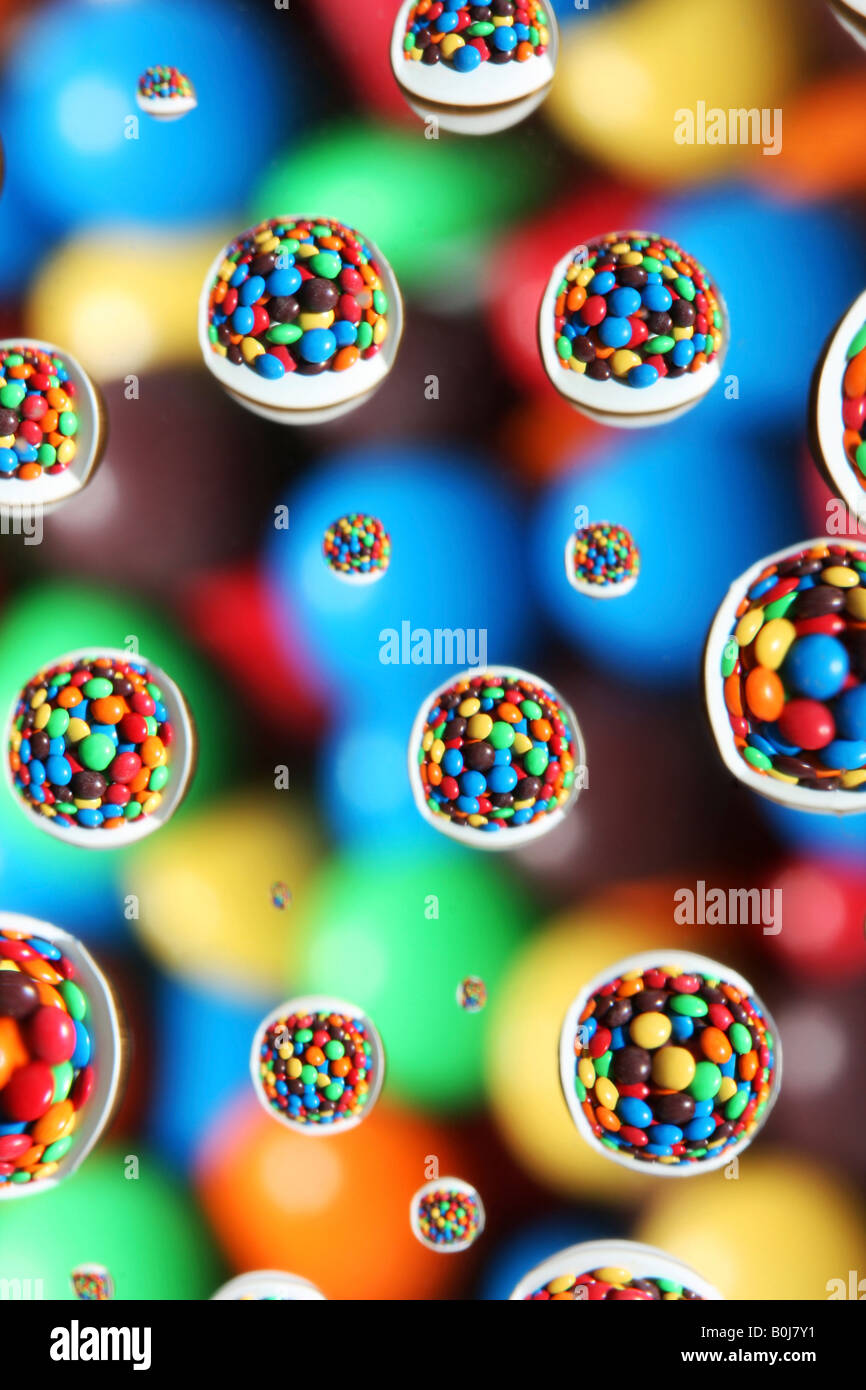 abstract background colorful candies reflected in water drops Stock ...