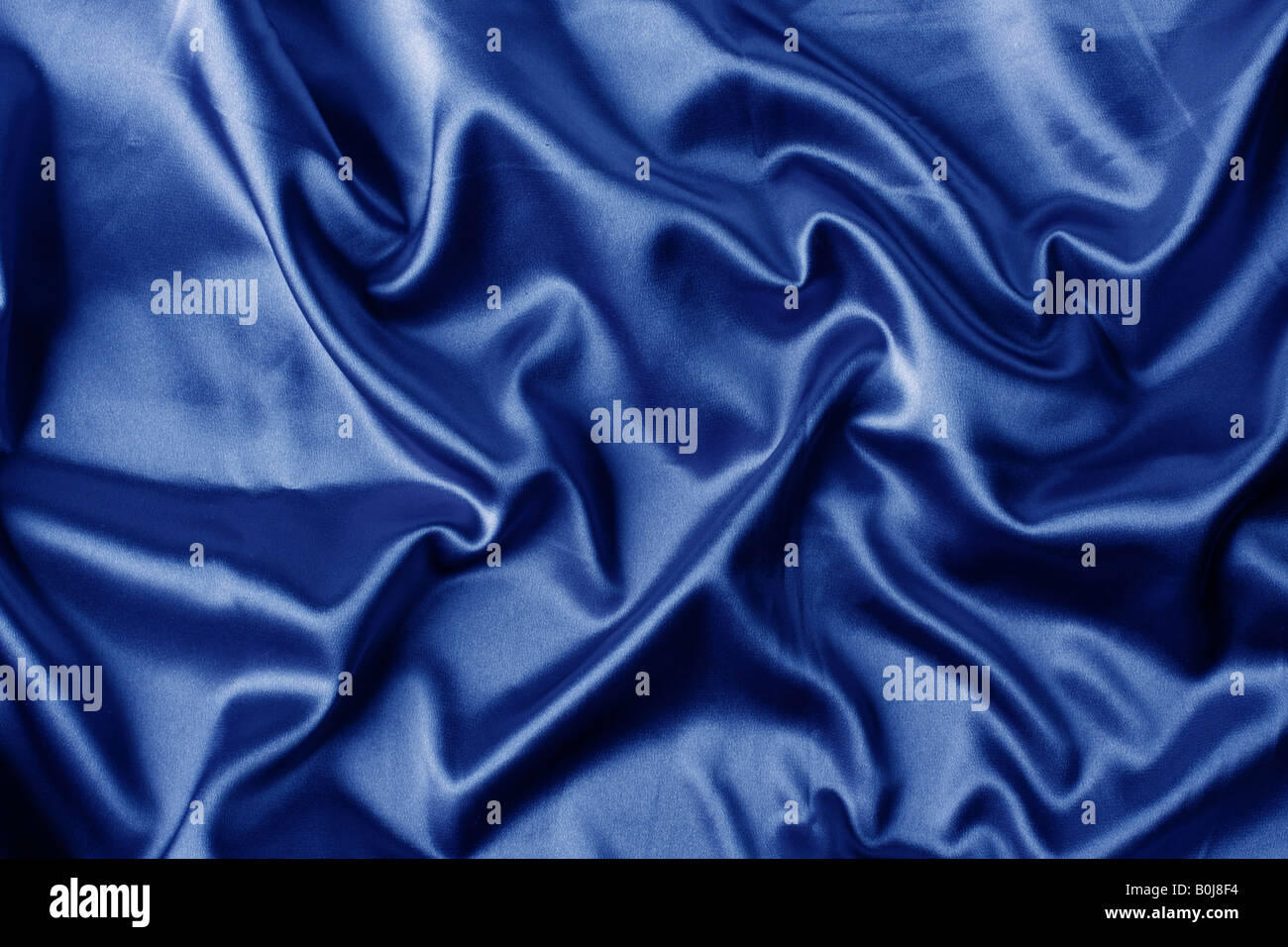 Luscious blue satin curvy and soft looking fantastic for backgrounds ...
