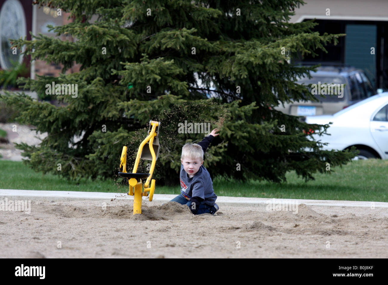 Playing in sand hi-res stock photography and images - Alamy