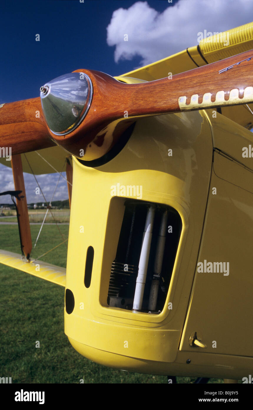 Wooden propeller and engine cowling of old British trainer biplane De ...