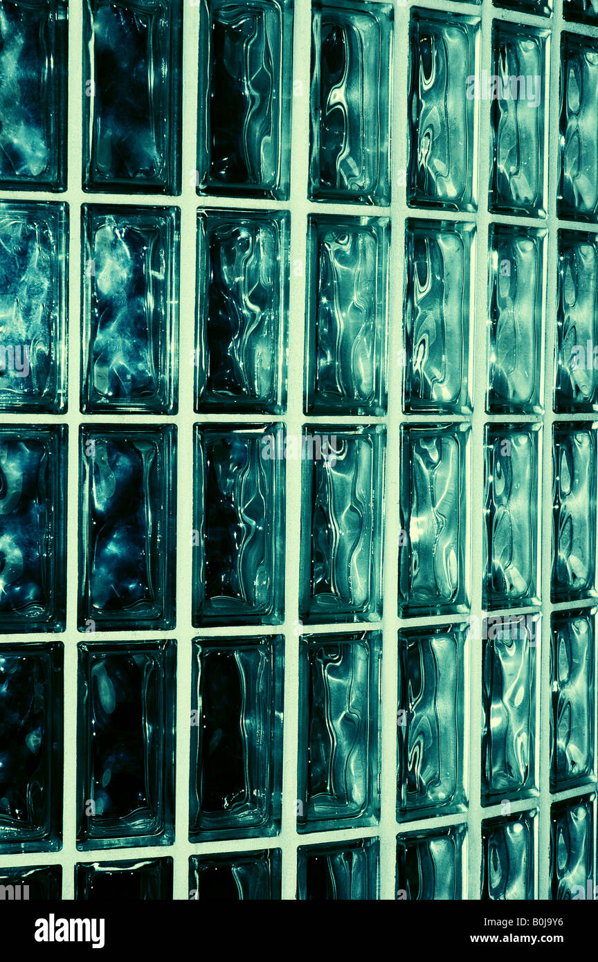Closeup of a greenish blue glass brick wall inside a building Stock ...
