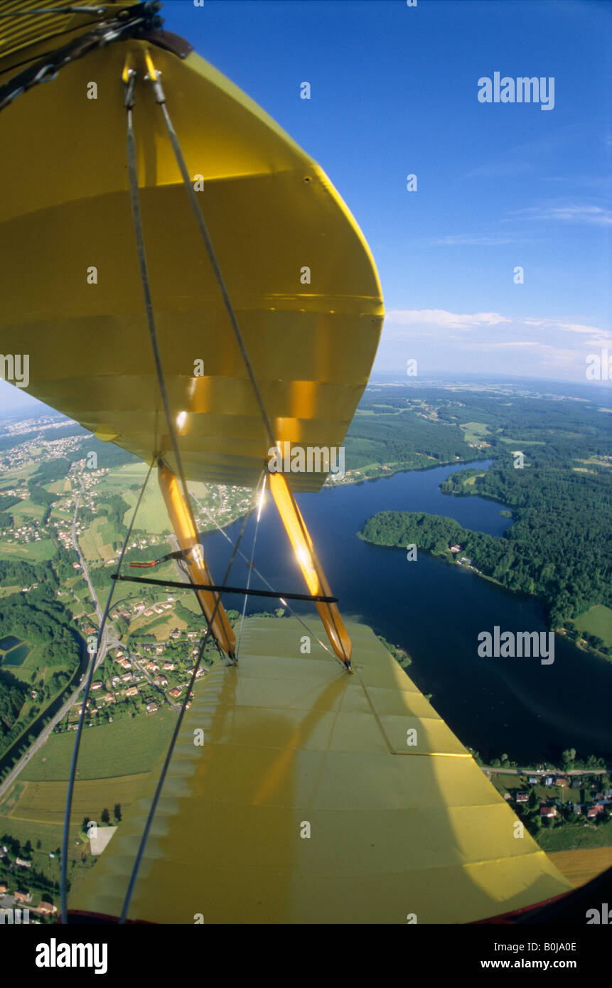 Inside cockpit view in flight of an old British trainer biplane De ...