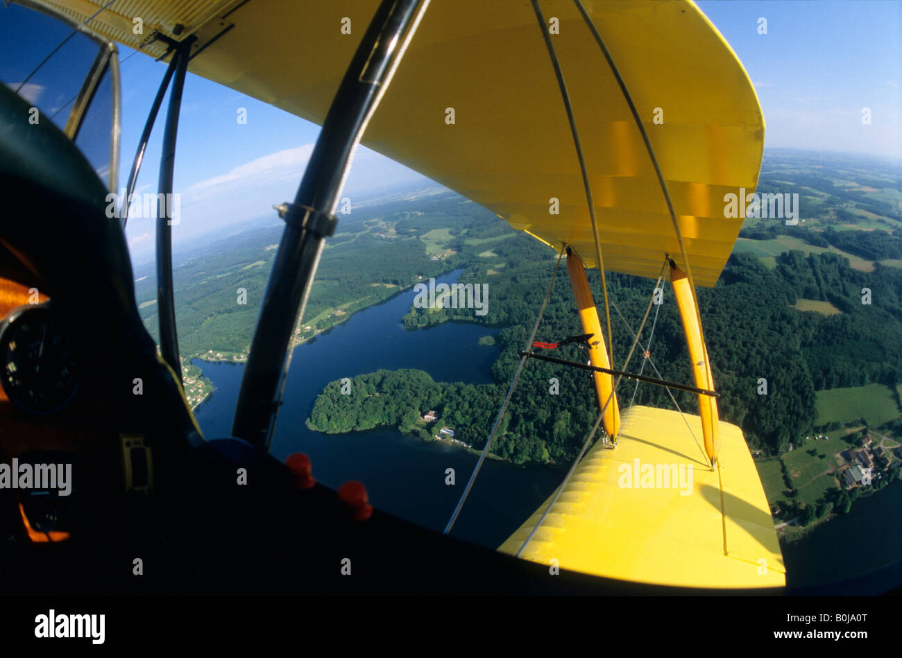 Inside cockpit view in flight of an old British trainer biplane De ...