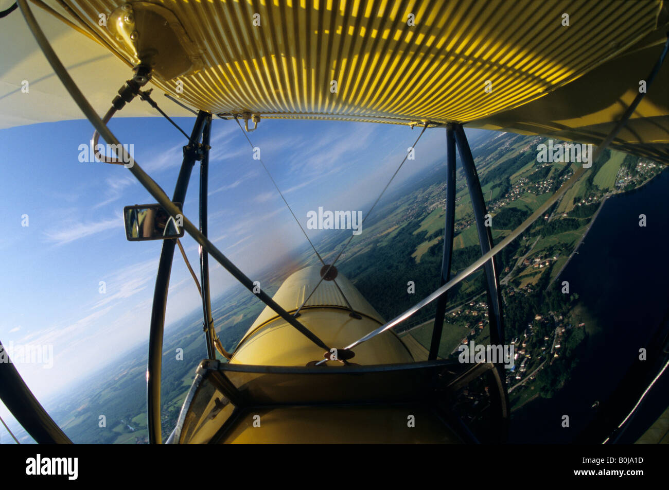 Inside cockpit view in flight of an old British trainer biplane De ...