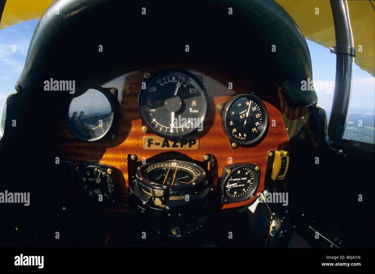 Inside cockpit view in flight of an old British trainer biplane De ...