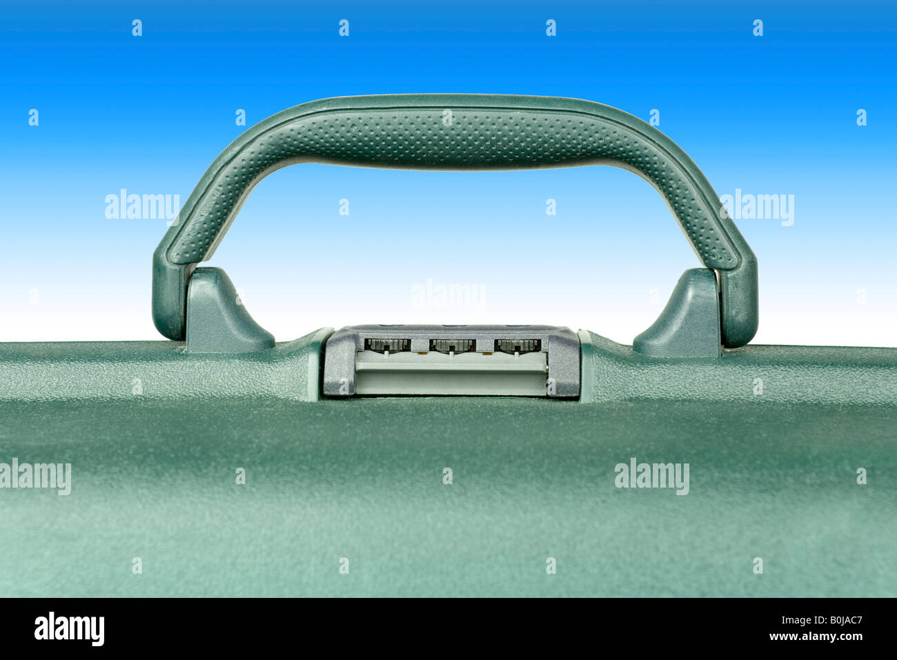 Handle of plastic travel suitcase Stock Photo - Alamy