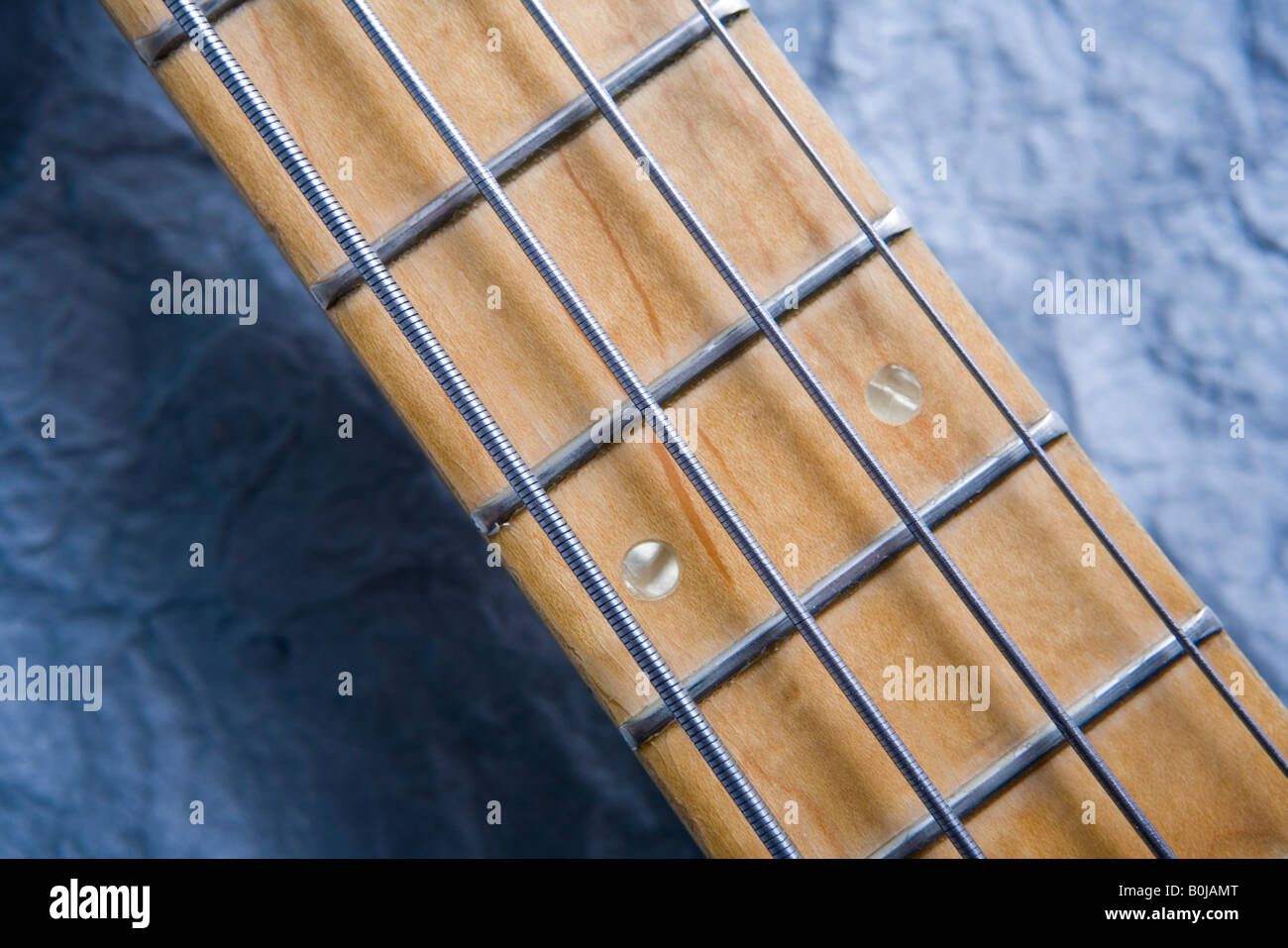 Electric bass guitar with four strings Stock Photo - Alamy