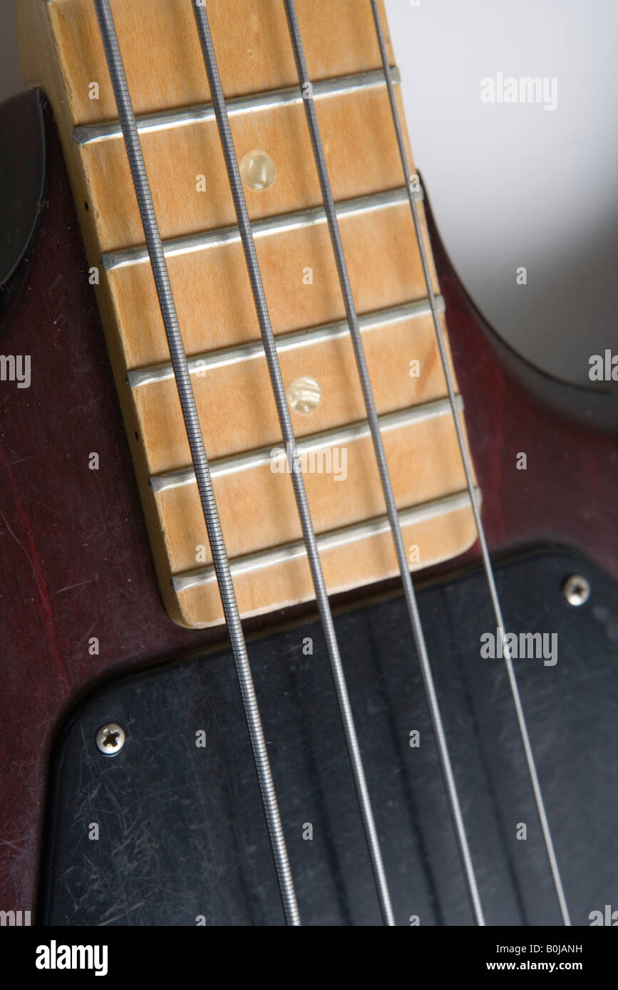 Electric bass guitar with four strings Stock Photo - Alamy