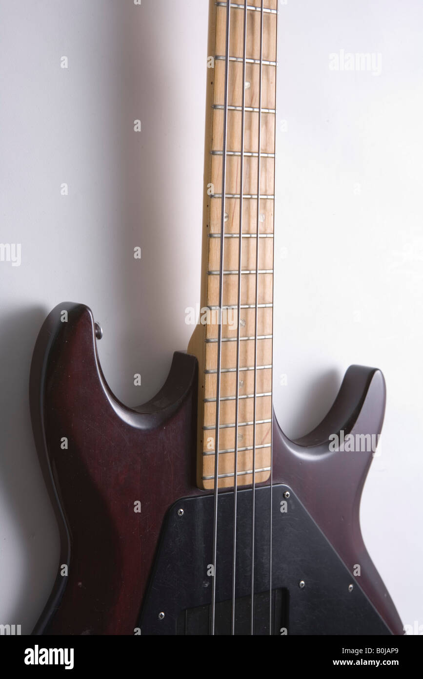 Electric bass guitar with four strings Stock Photo - Alamy