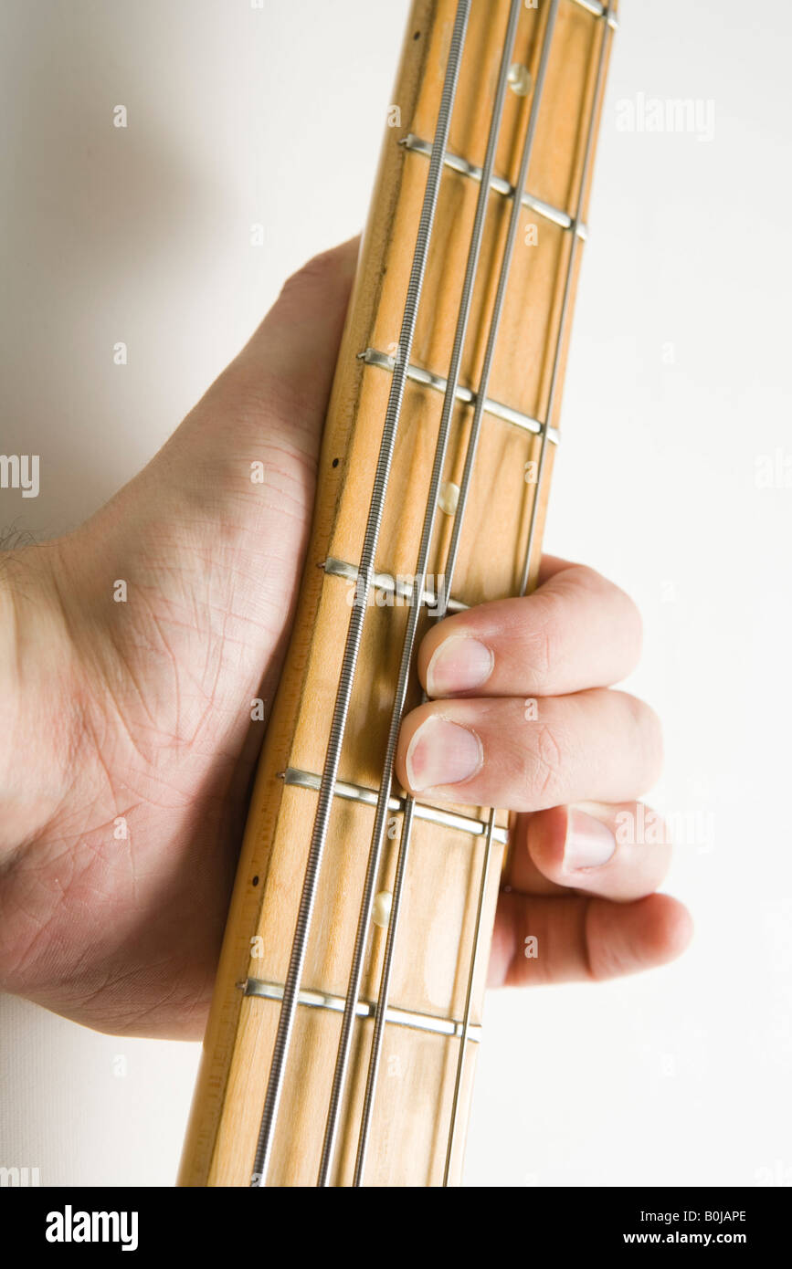 Electric bass guitar with four strings Stock Photo - Alamy