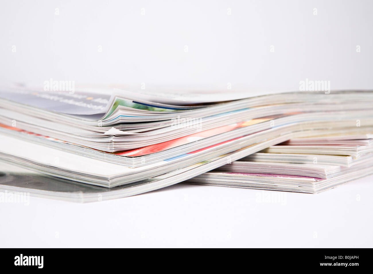 Stack of glossy periodical magazines Stock Photo - Alamy