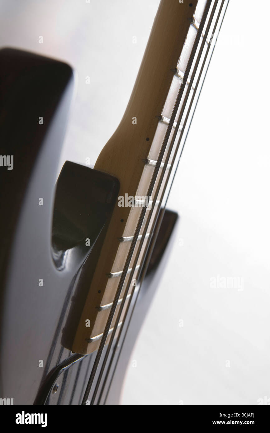 Electric bass guitar with four strings Stock Photo - Alamy
