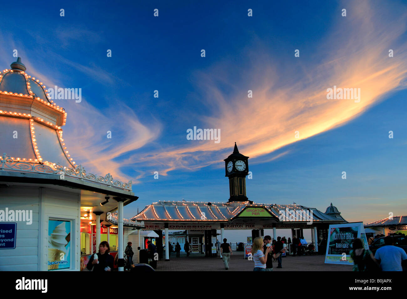 Dramatic Sunset clouds Clock Tower Palace Pier Brighton Sussex England ...