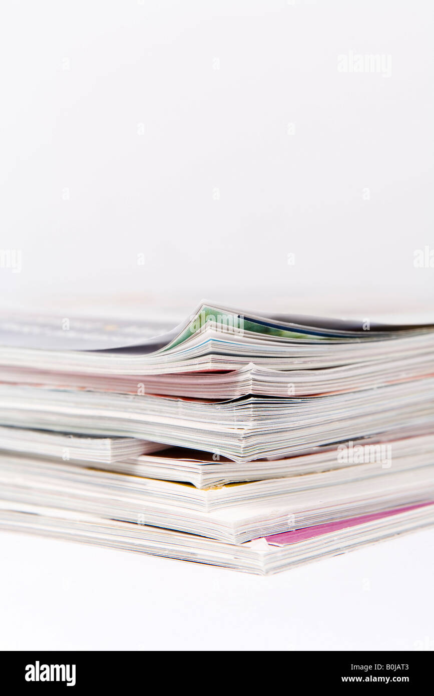 Stack of glossy periodical magazines Stock Photo - Alamy