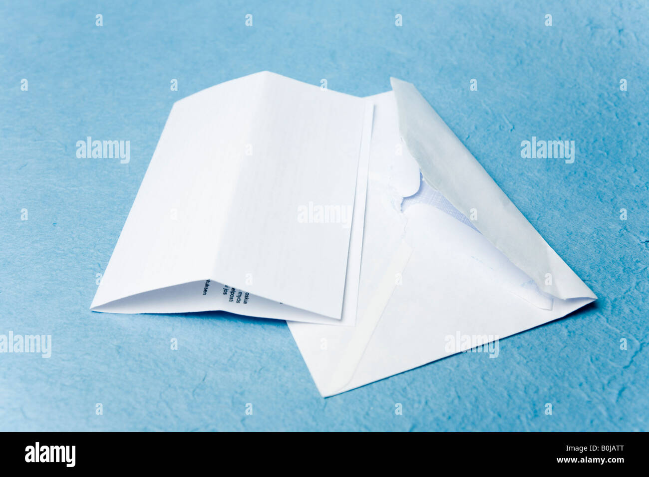 Opened envelope and letter still life photo Stock Photo - Alamy