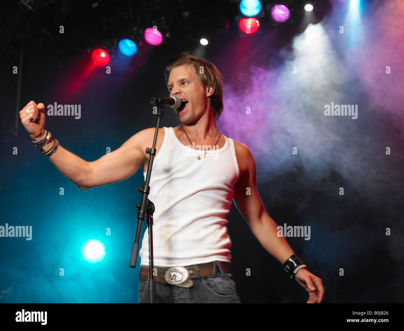 Pop Singer Performing on Stage Stock Photo - Alamy