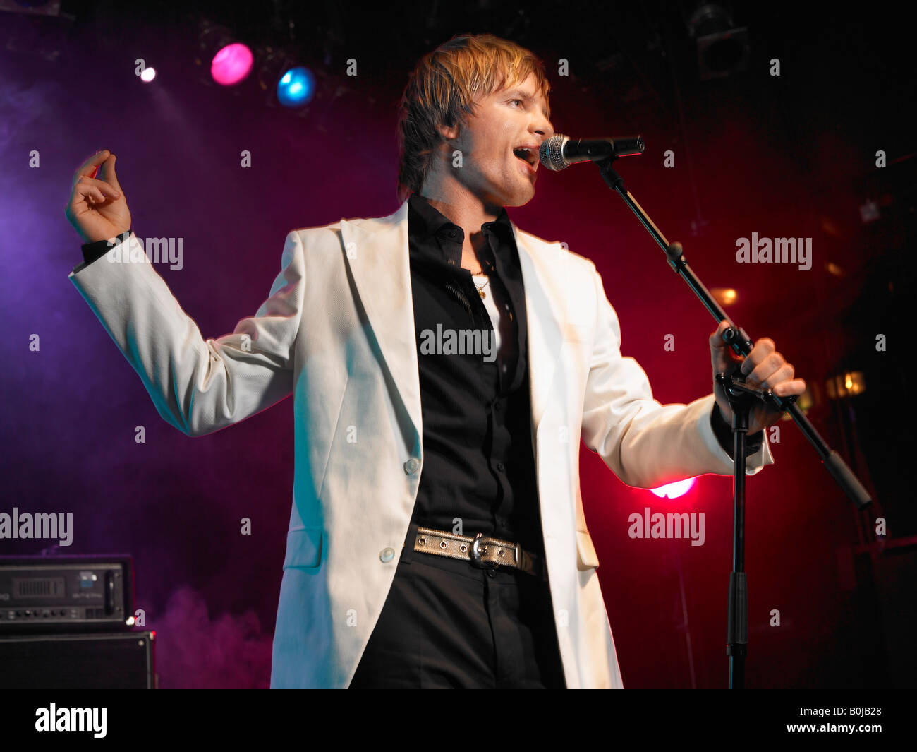 Pop Singer Performing on Stage Stock Photo - Alamy