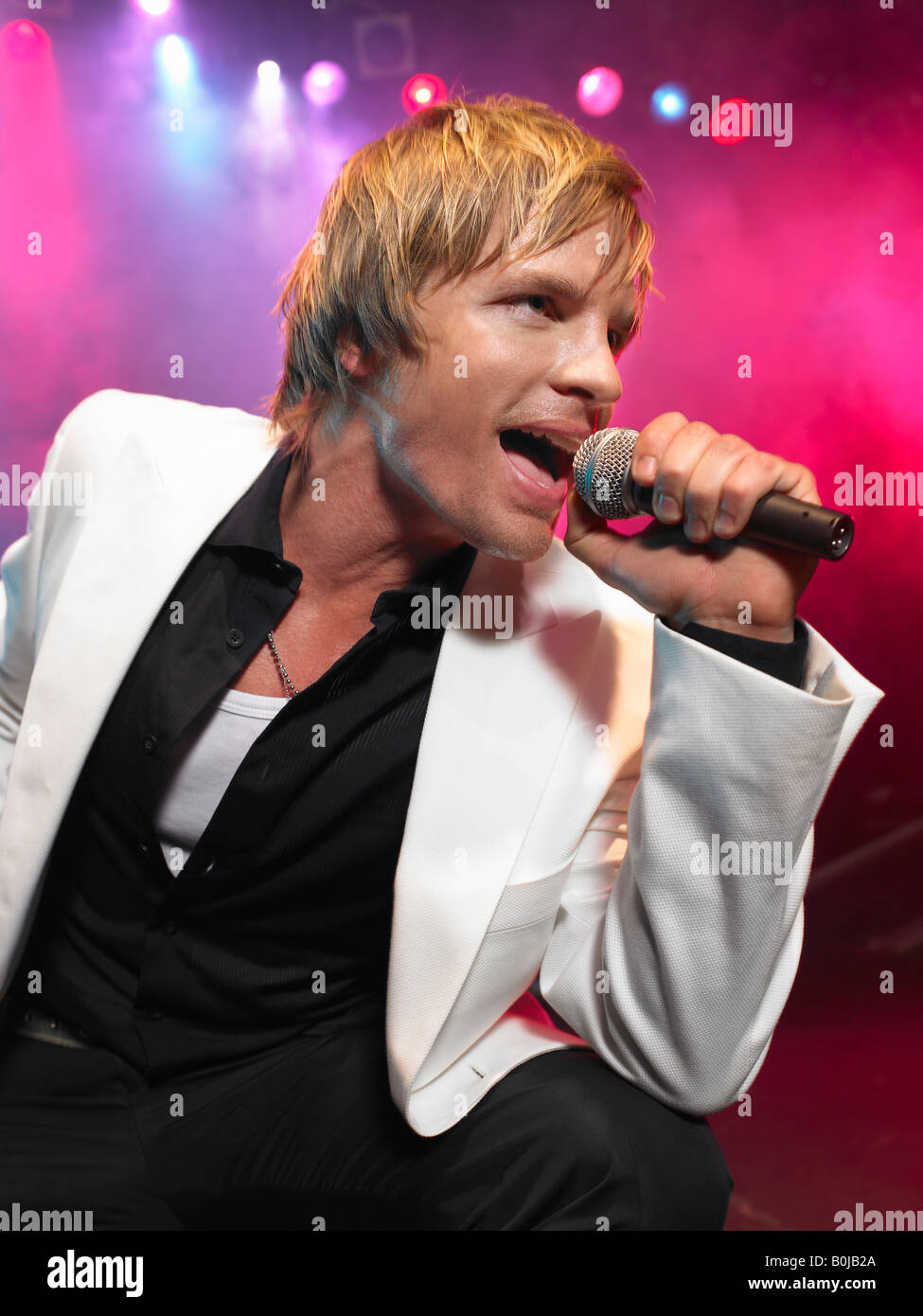 Pop Singer Performing on Stage Stock Photo - Alamy