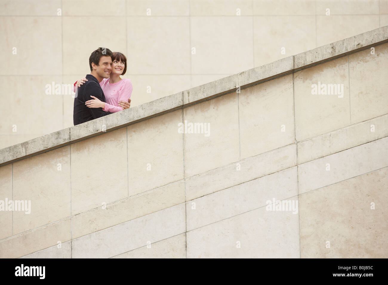 Affectionate Couple Sightseeing on Steps Stock Photo - Alamy