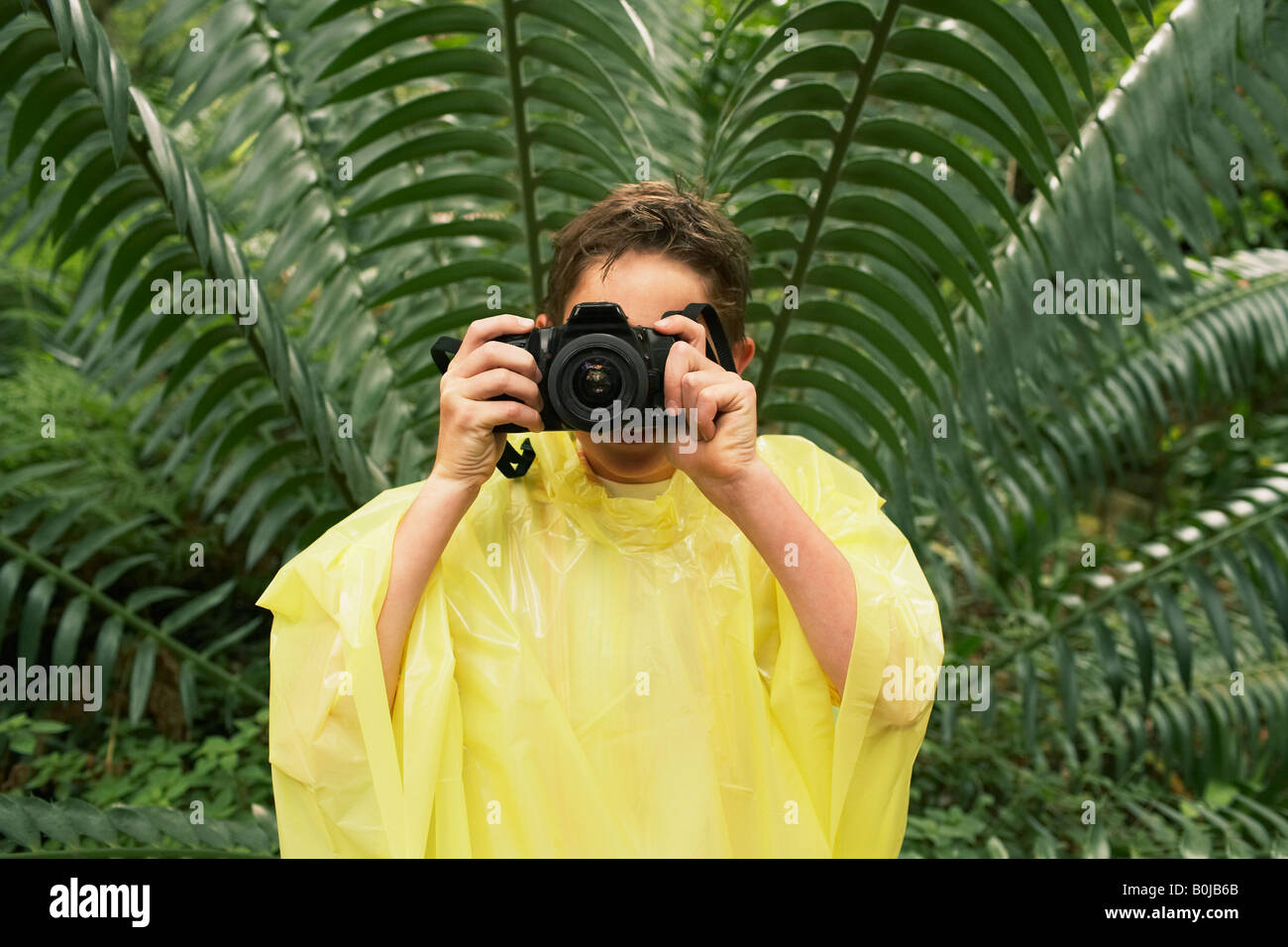 Boy with Camera Stock Photo - Alamy
