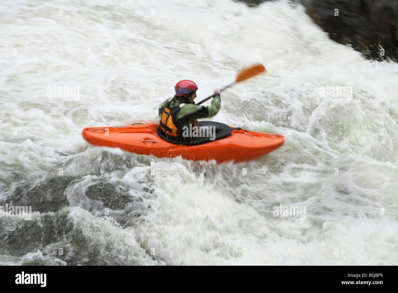 Man kayaking in river Stock Photo - Alamy