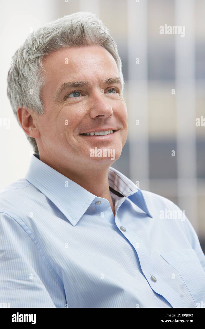 Man looking up smiling Stock Photo - Alamy