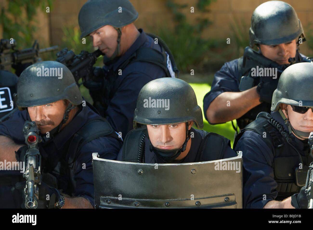 Half length shield hi-res stock photography and images - Alamy