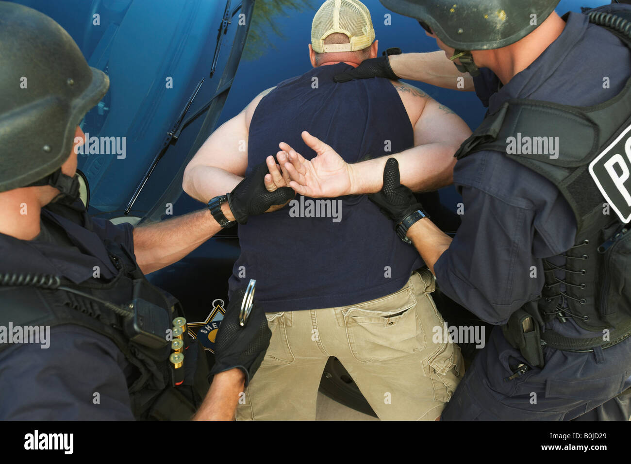 Military putting on protective hi-res stock photography and images - Alamy