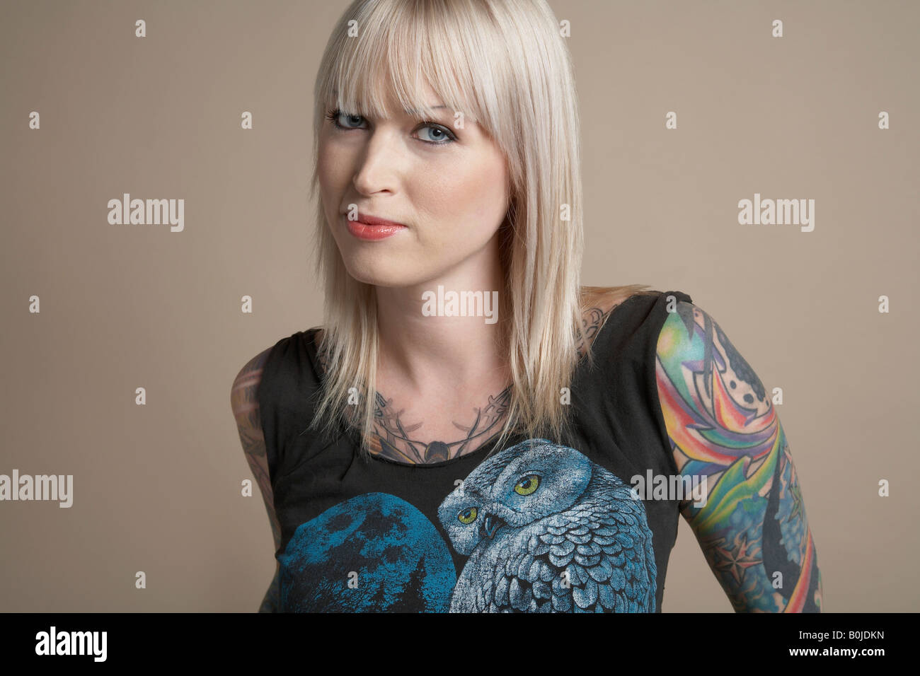 Young tattooed woman, portrait Stock Photo - Alamy Young tattooed woman, portrait Stock Photo - Alamy