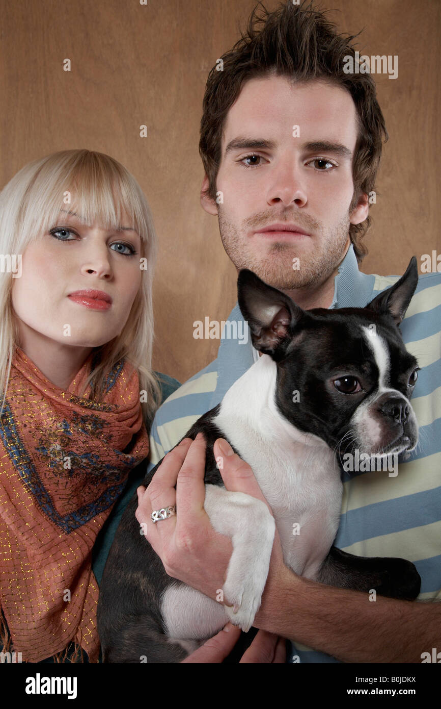Young couple with French Bulldog, portrait Stock Photo - Alamy