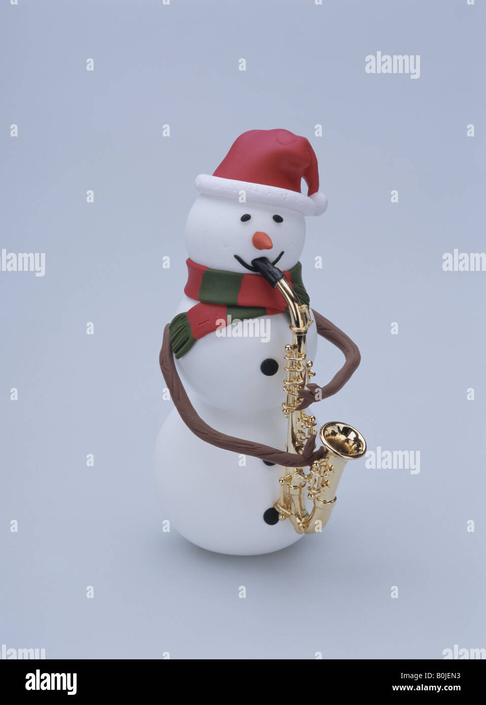 Snowman with a saxophone hi-res stock photography and images - Alamy