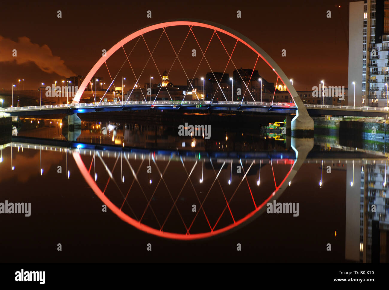 A night view of Glasgow's Clyde Arc bridge known localy as the Squinty ...