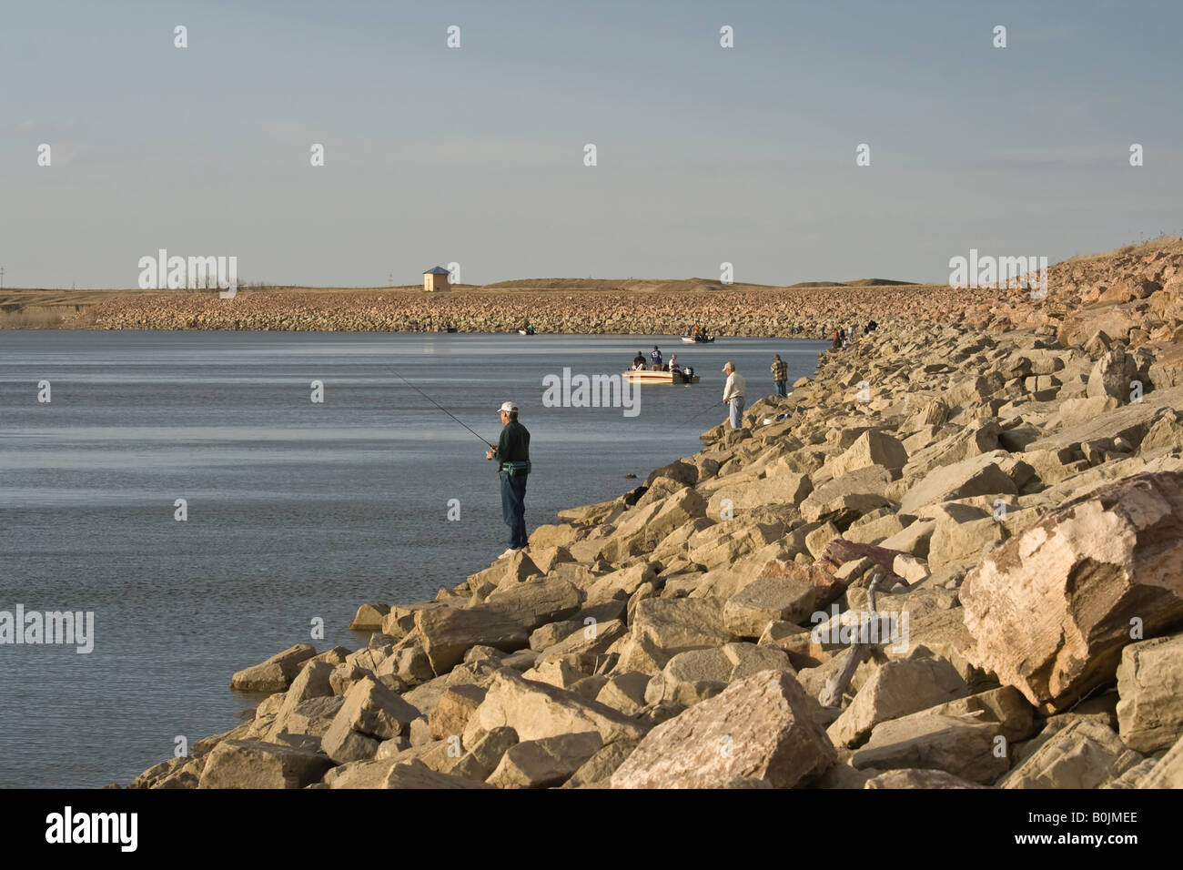 Man fishing at dam hi-res stock photography and images - Alamy