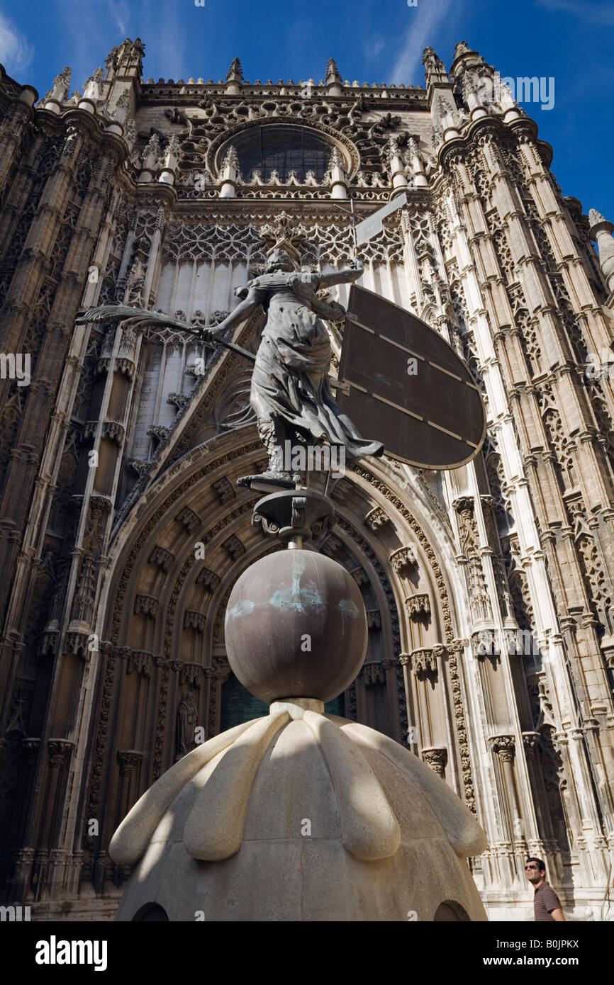 Seville, Andalusia, Spain. Statue at entrance to Cathedral Stock Photo ...