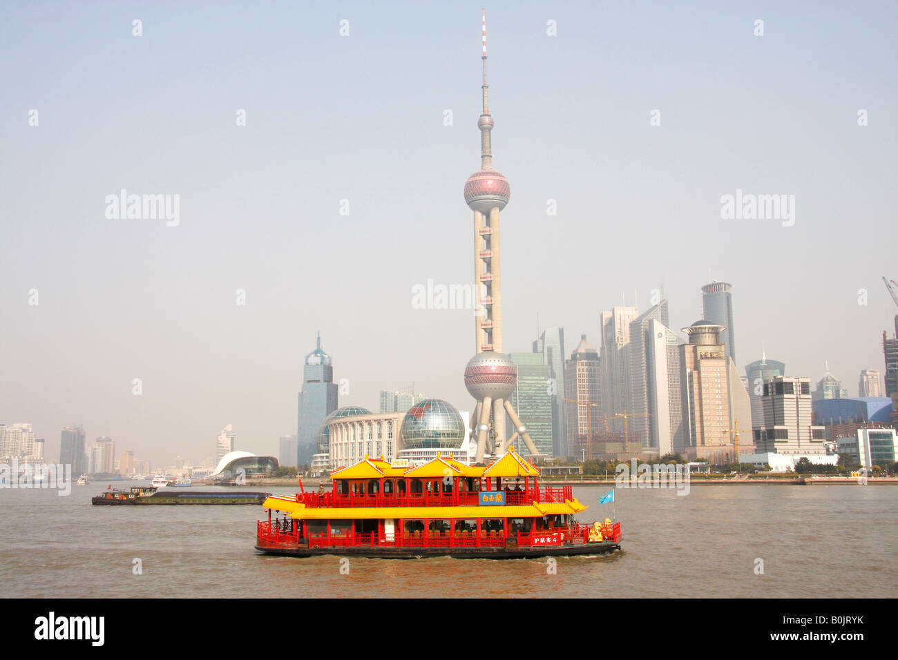 Sightseeing boat sailing along the Huangpu River ,Shanghai with the ...