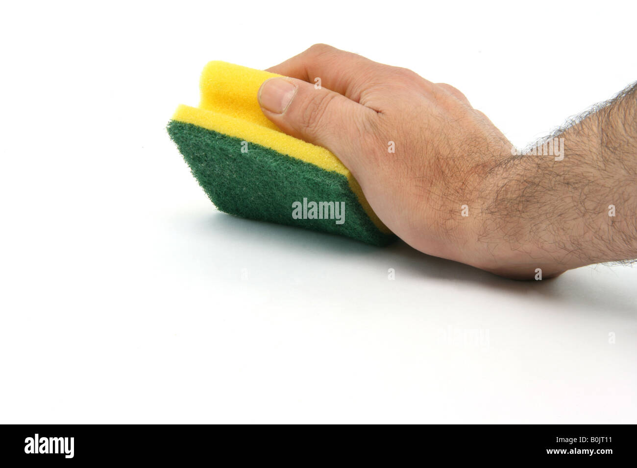 housekeeping and cleaning concepts hand with sponge isolated on white ...