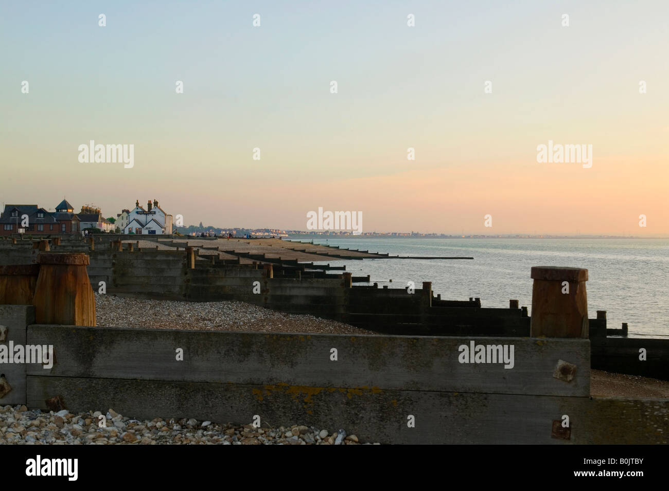 Whitstable beach Kent UK at sunset Stock Photo - Alamy