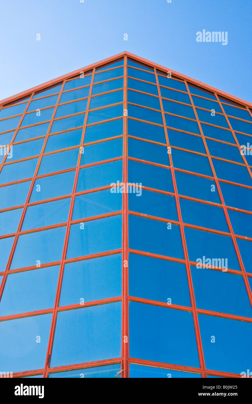 Blue windows from office building against blue sky Stock Photo - Alamy