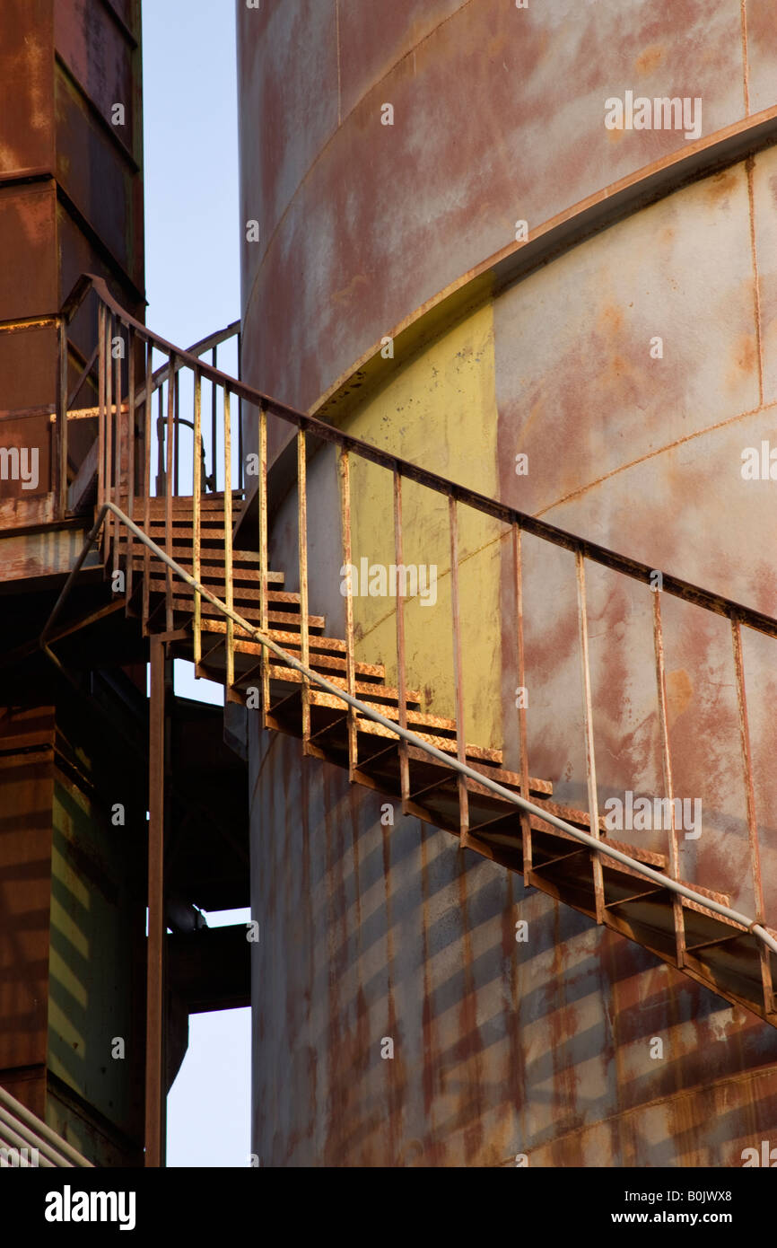Rusty 'spiral' metal stairs leading upward Stock Photo - Alamy