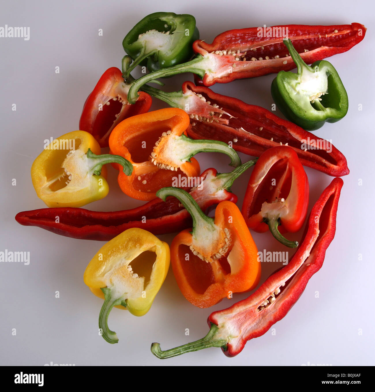 Coloured Peppers Sliced in half Stock Photo - Alamy