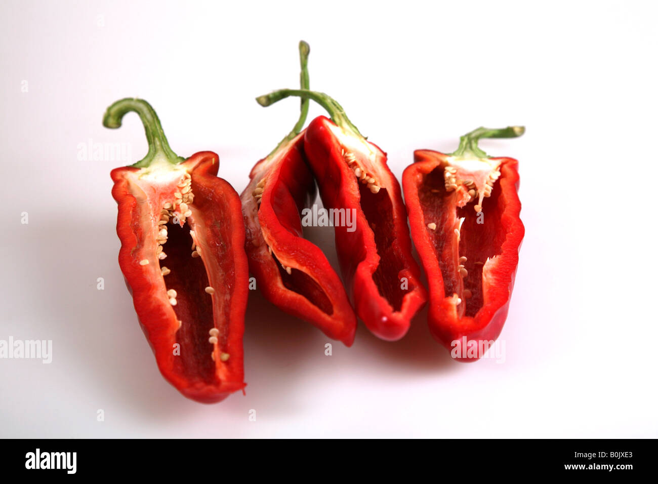 Cut Red Chili Peppers Stock Photo - Alamy