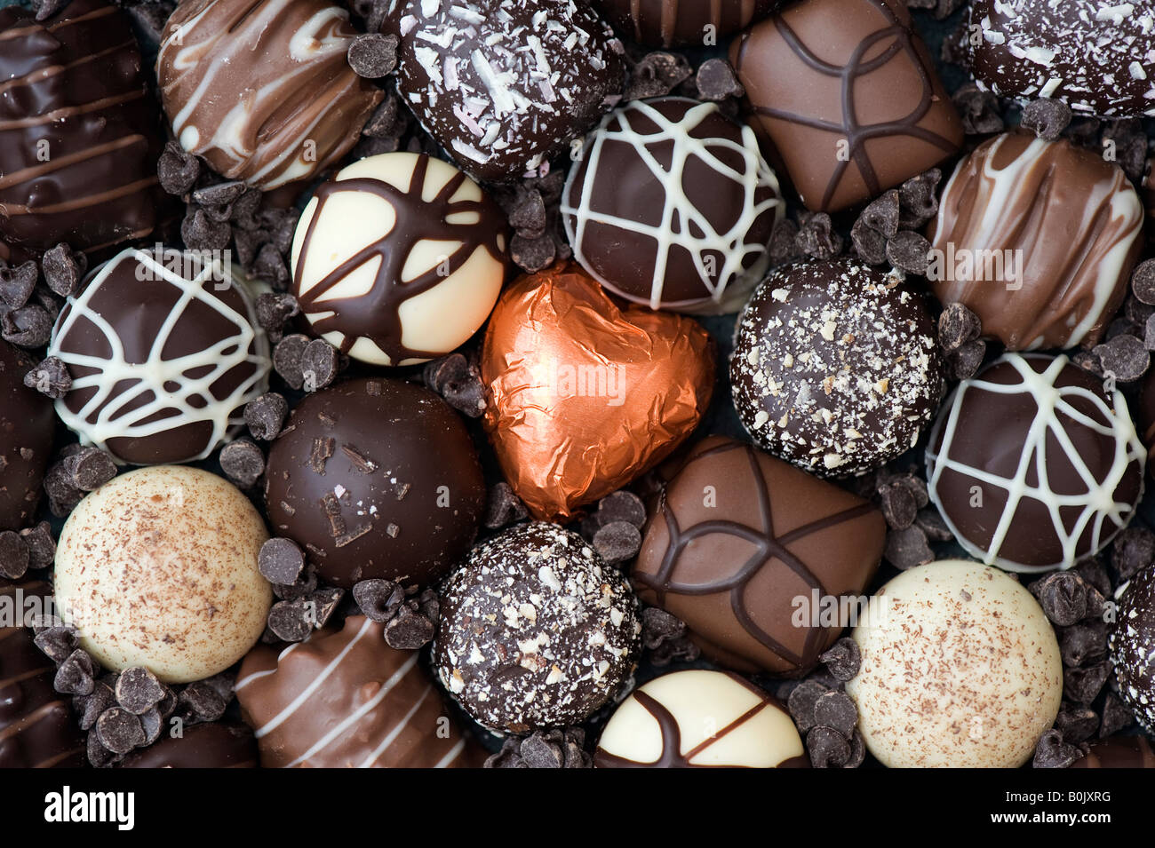 Chocolates in colourful wrapper hi-res stock photography and images - Alamy