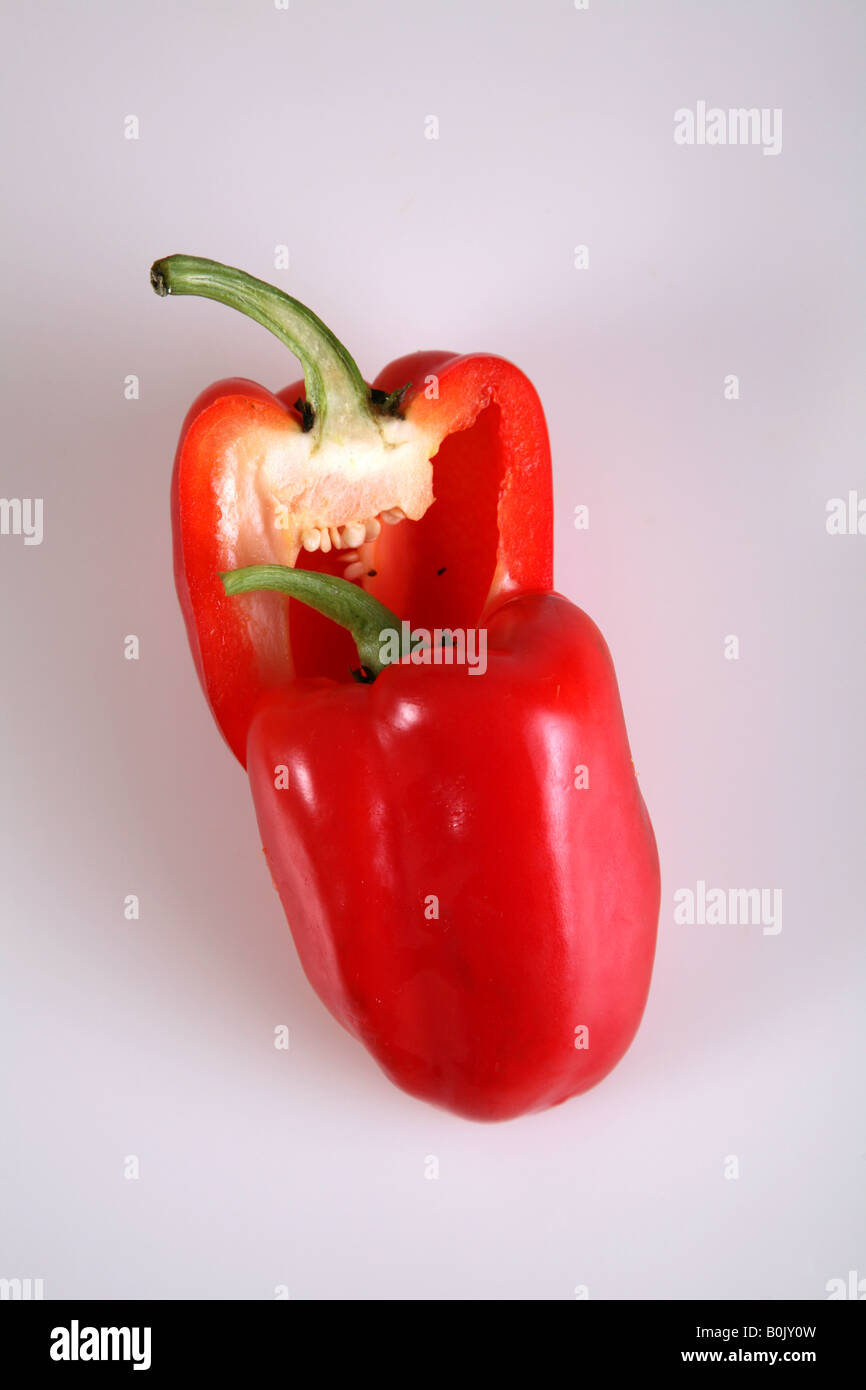 Red Bell Pepper Sliced in half Stock Photo - Alamy