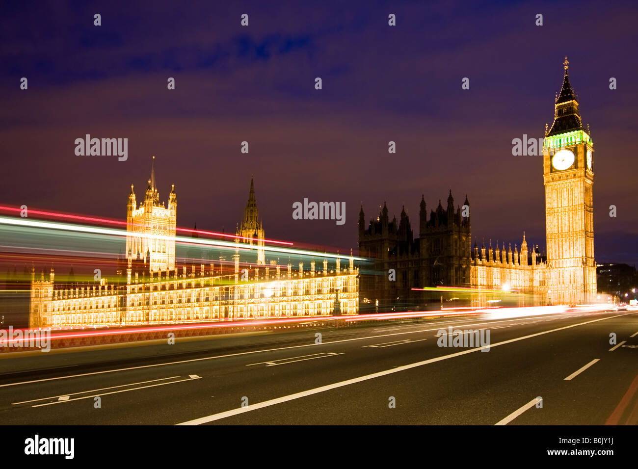 Nocturne scene with Big Ben behind light beams Stock Photo - Alamy