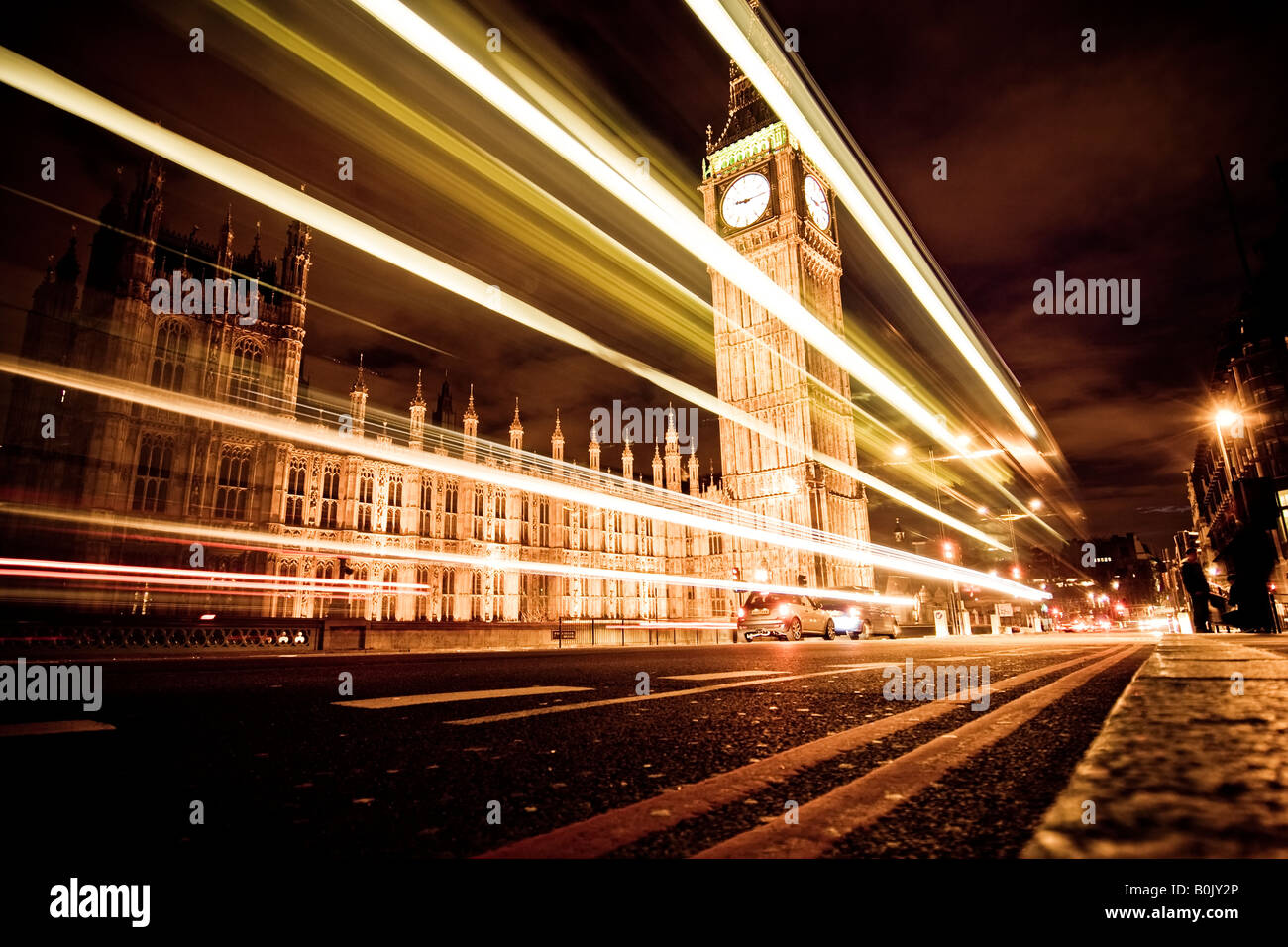 Nocturne scene with Big Ben behind light beams dark toned Stock Photo ...