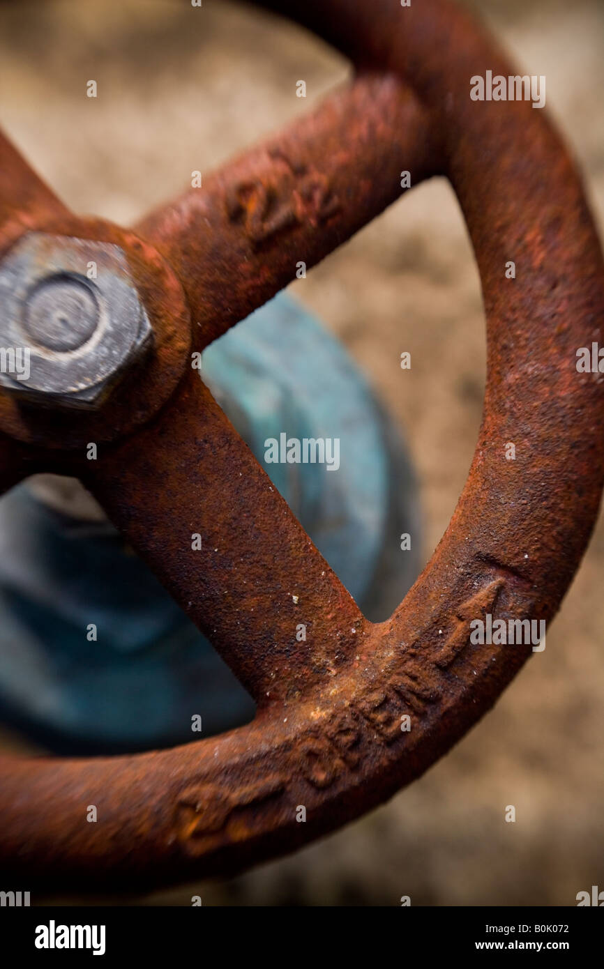 Rusty valve handle Stock Photo - Alamy