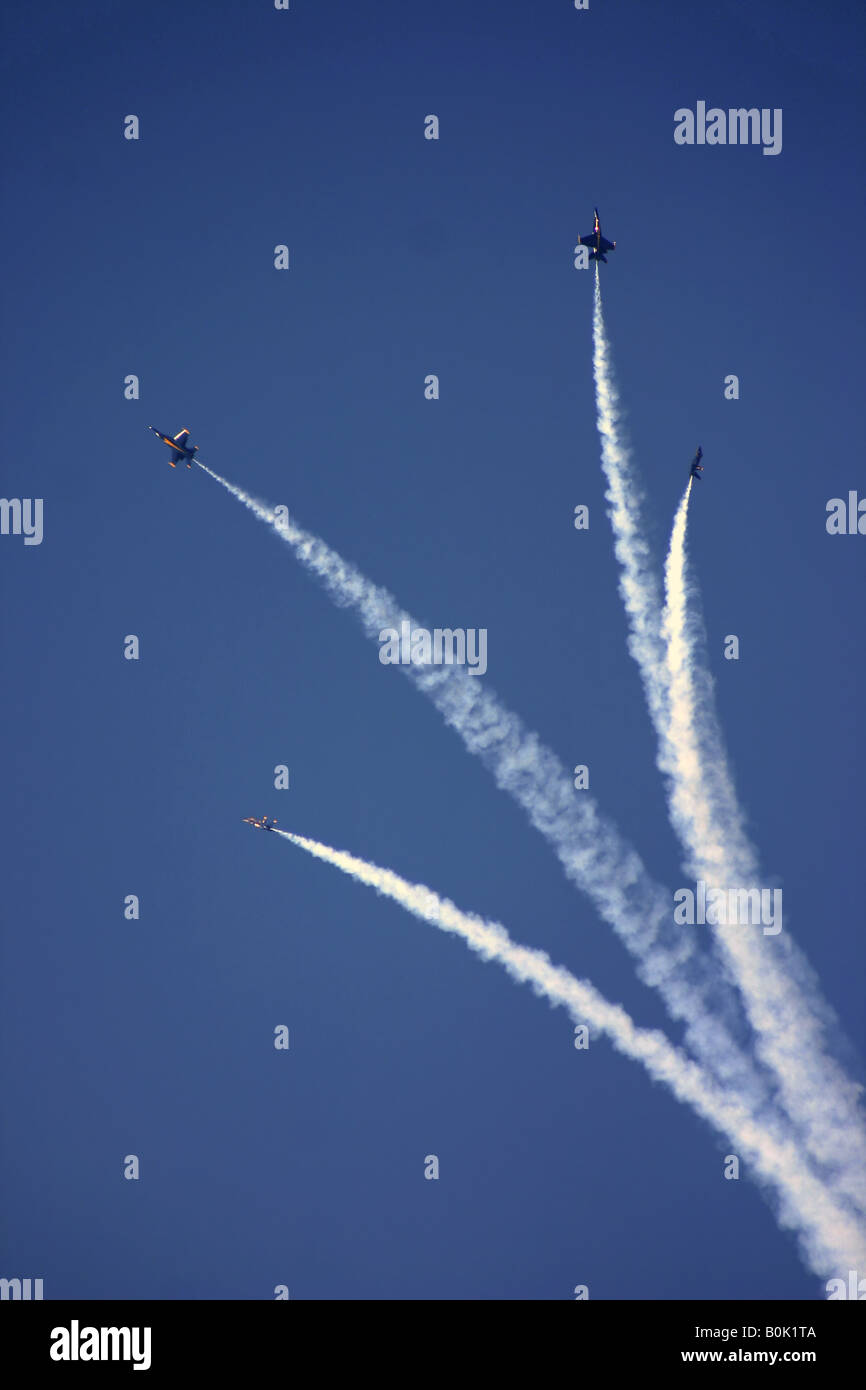Jets breaking formation with Smoke at Air Show Stock Photo - Alamy